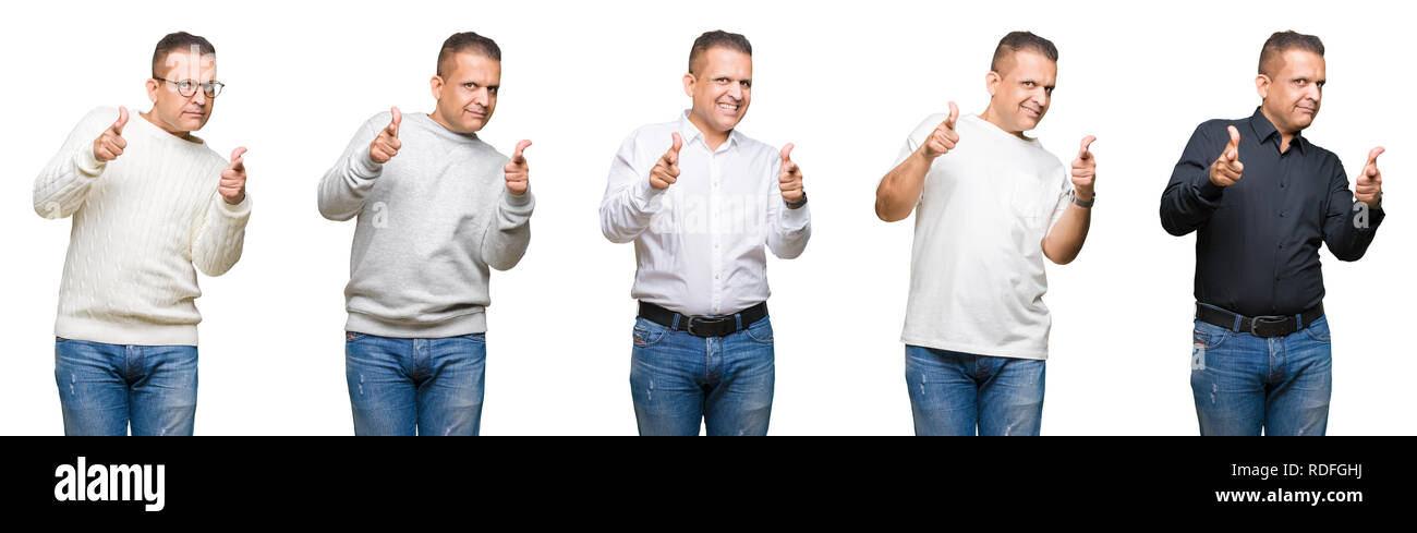 Composition of arab middle age man over isolated background pointing ...