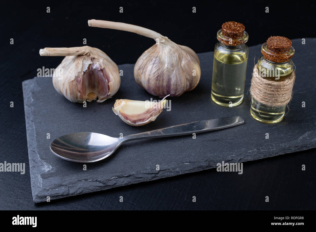 Garlic and medicinal juice for colds. Home remedies for colds. Dark ...