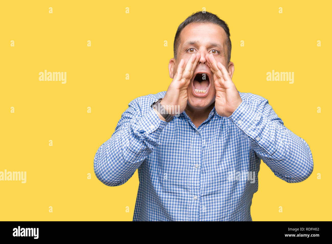 Middle age arab business man over isolated background Shouting angry ...