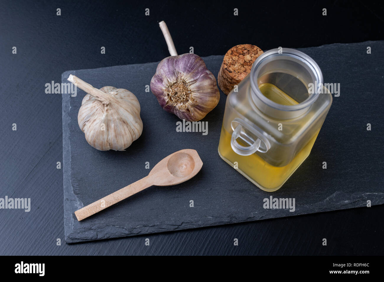 Garlic and medicinal juice for colds. Home remedies for colds. Dark ...