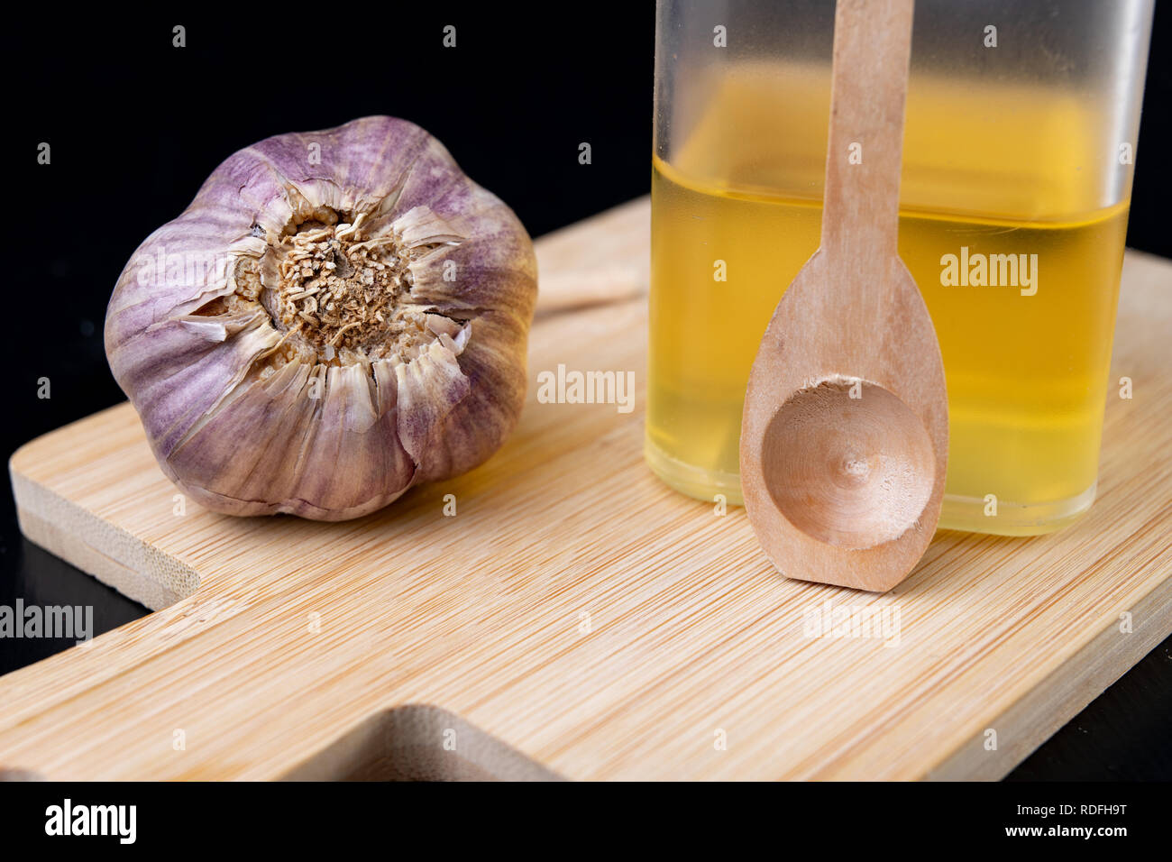 Garlic and medicinal juice for colds. Home remedies for colds. Dark ...