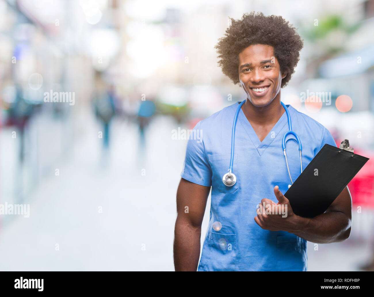 Afro american surgeon doctor holding clipboard man over isolated ...