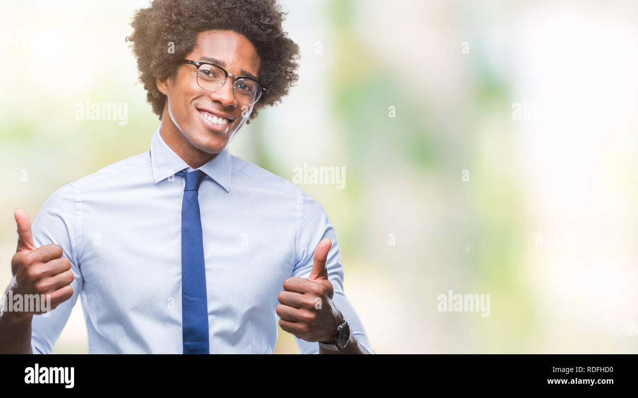 Afro american business man wearing glasses over isolated background ...