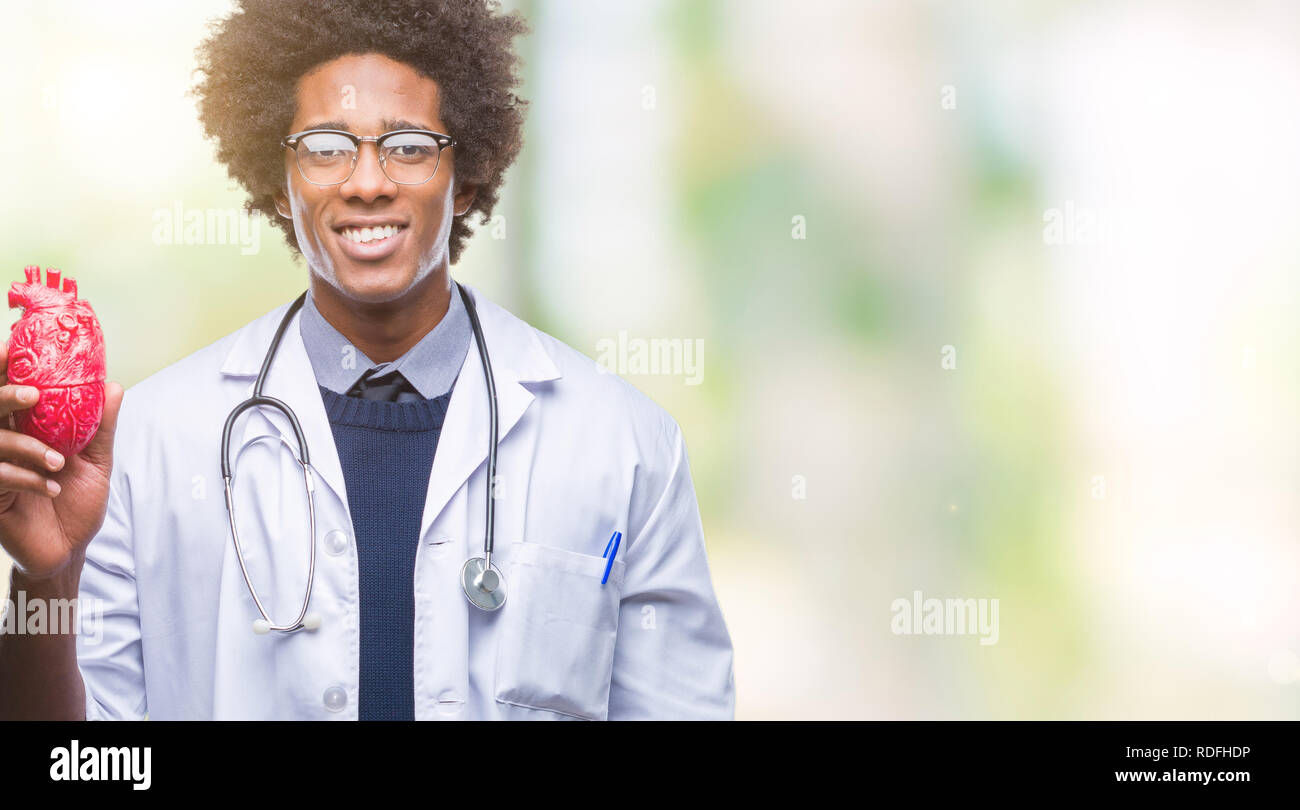 Afro american cardiologist doctor man over isolated background with a ...