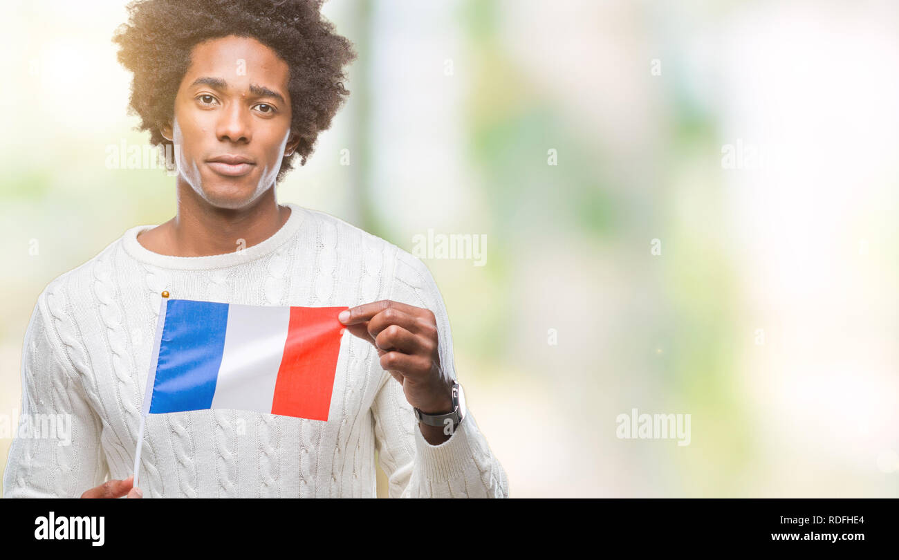 Afro american man flag of France over isolated background with a ...
