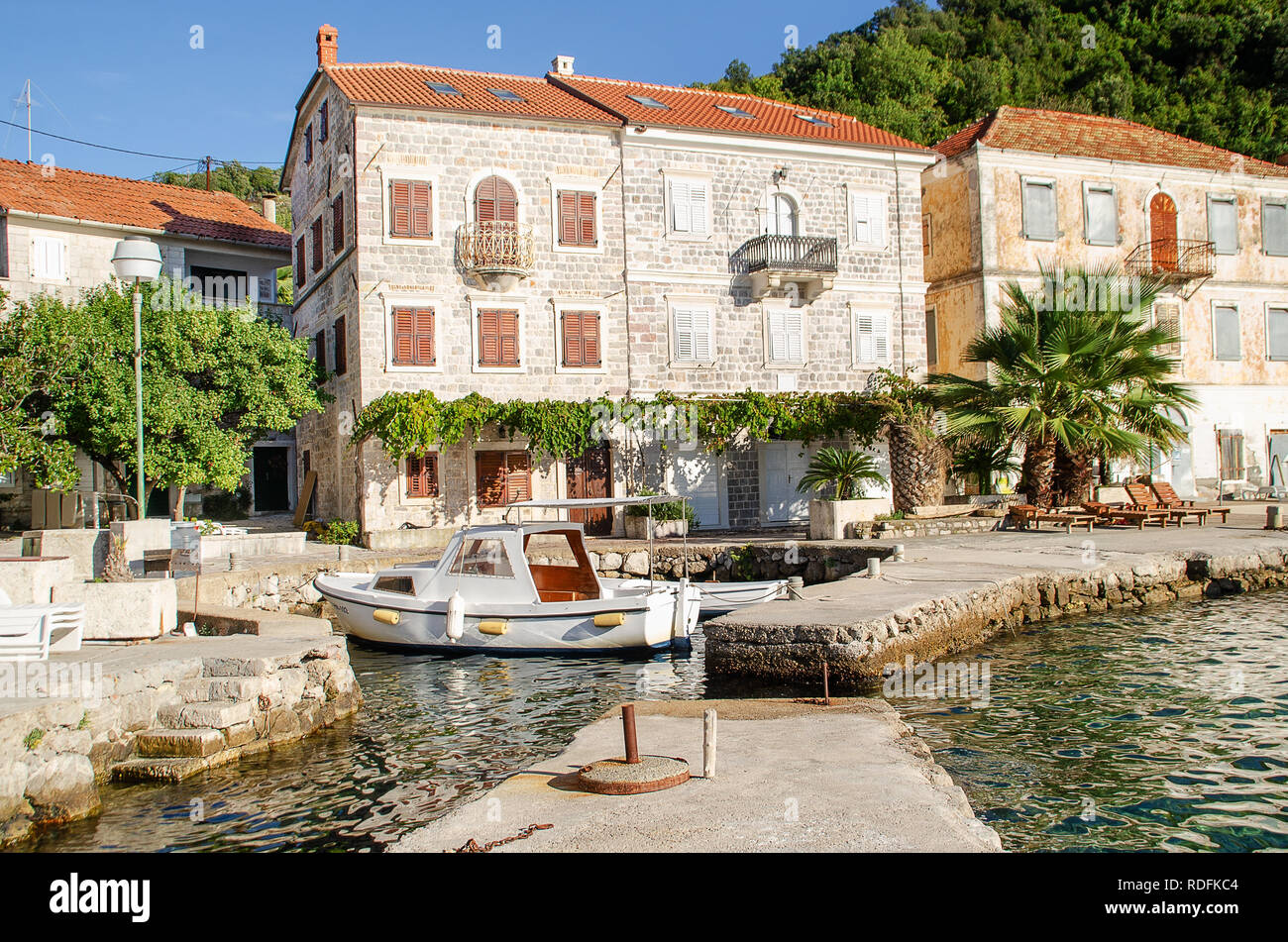 View of Rose Village quayside on Lustica peninsula, Kotor Bay ...
