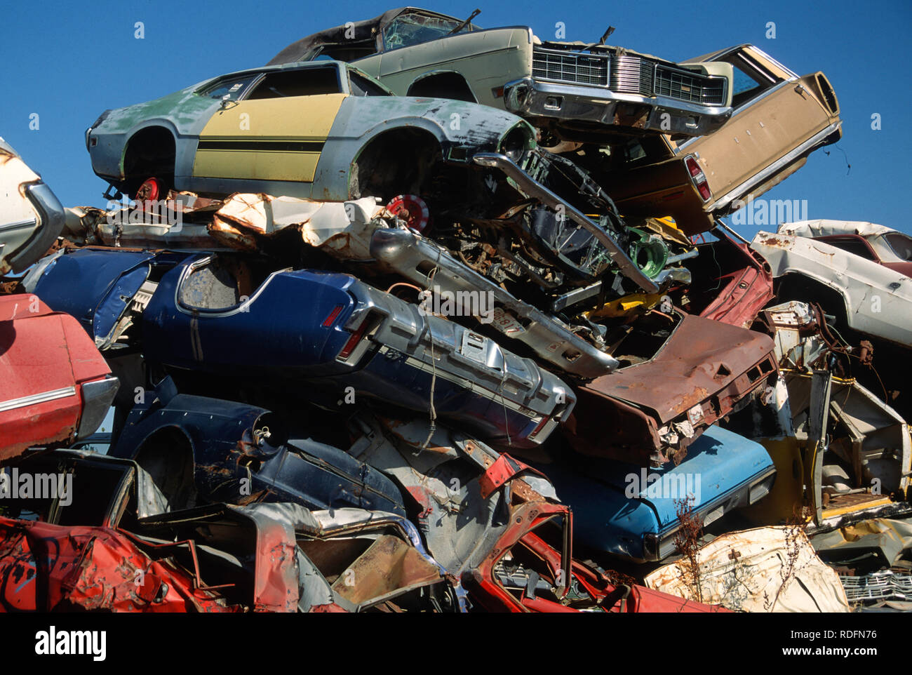 Pile stacked junk cars discarded hi-res stock photography and images ...