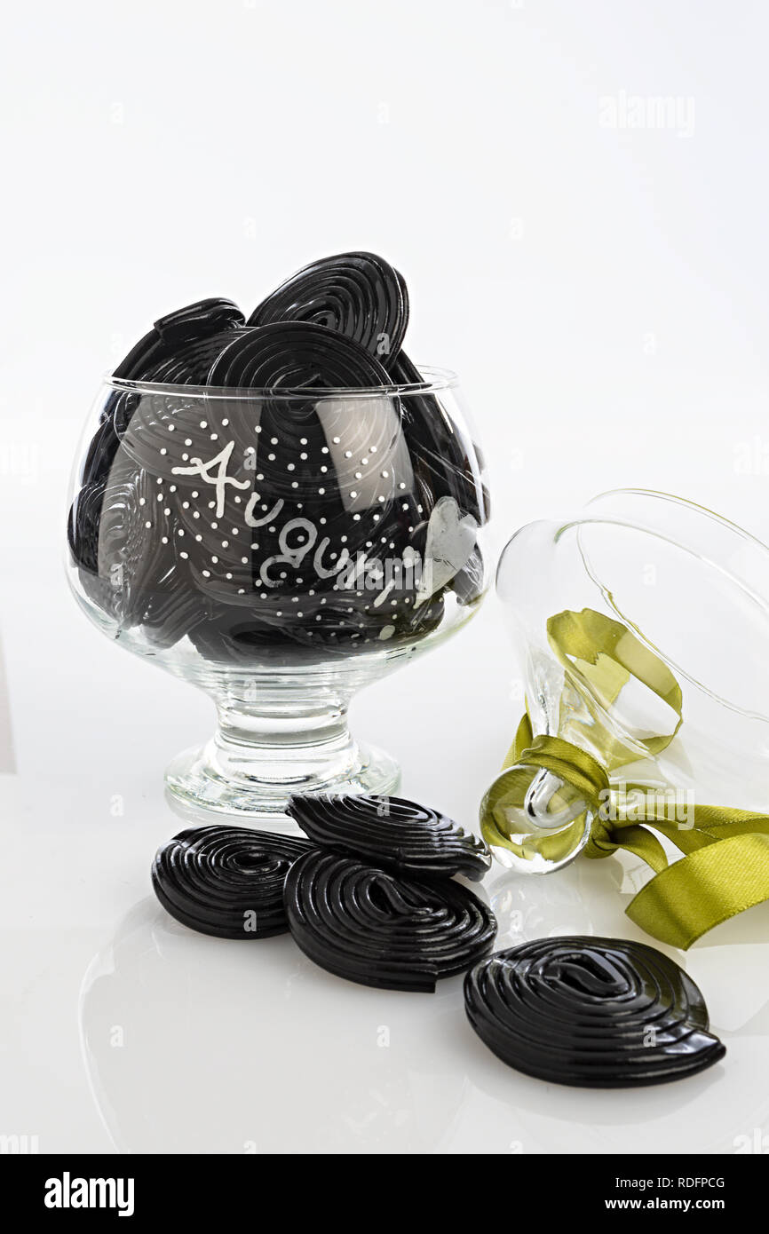 licorice wheels in glass front vase Stock Photo - Alamy