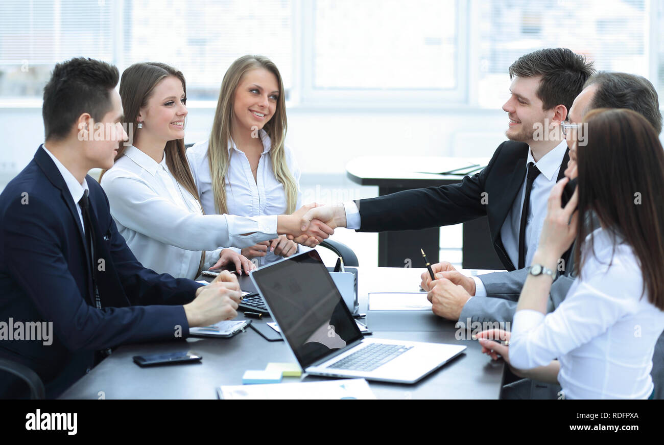 business partners shaking hands after a successful transaction Stock ...