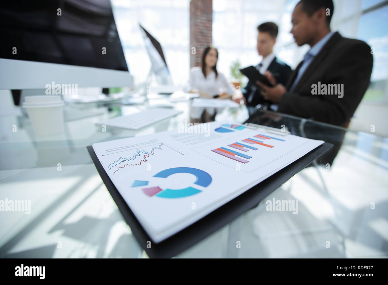 closeup.financial charts on the Desk of the business team Stock Photo ...