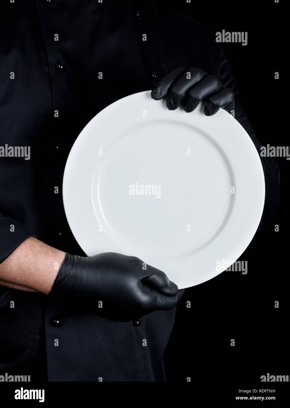 Black uniform hi-res stock photography and images - Alamy