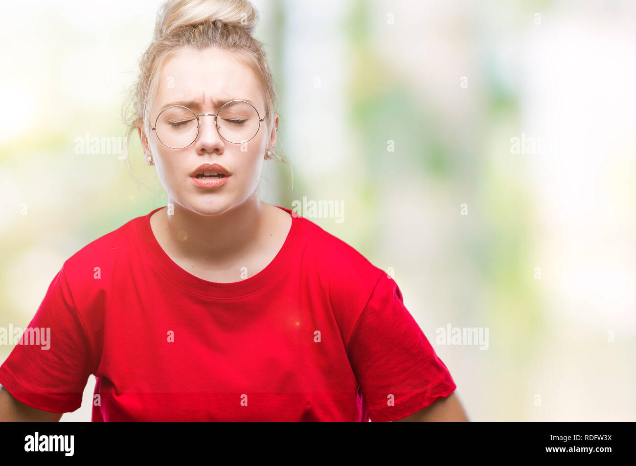 Young blonde woman wearing glasses over isolated background with hand ...