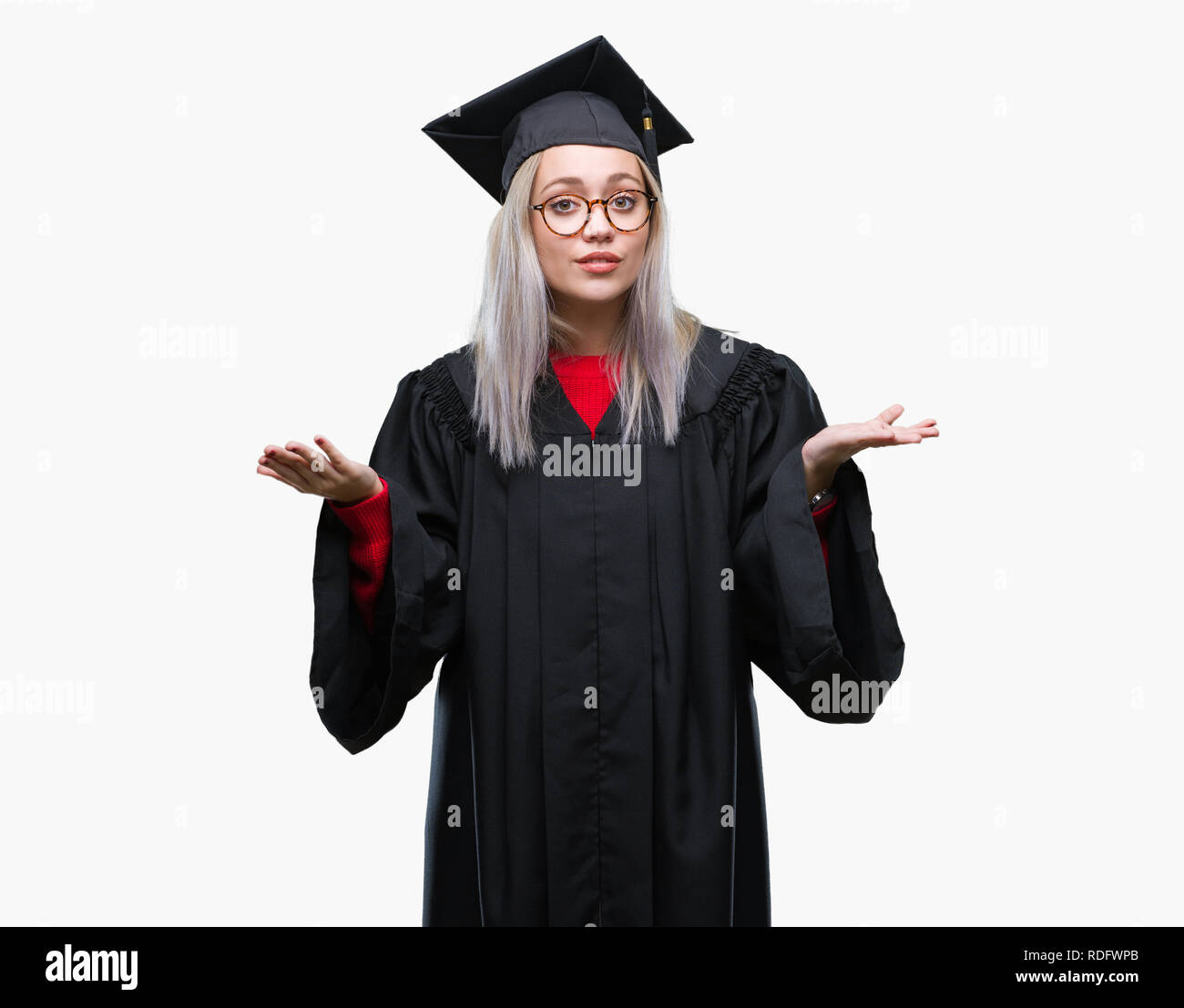Young blonde woman wearing graduate uniform over isolated background ...