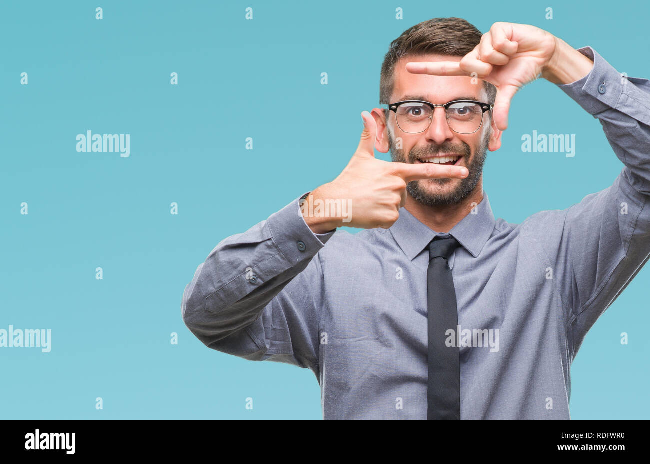 Young handsome business man over isolated background smiling making ...