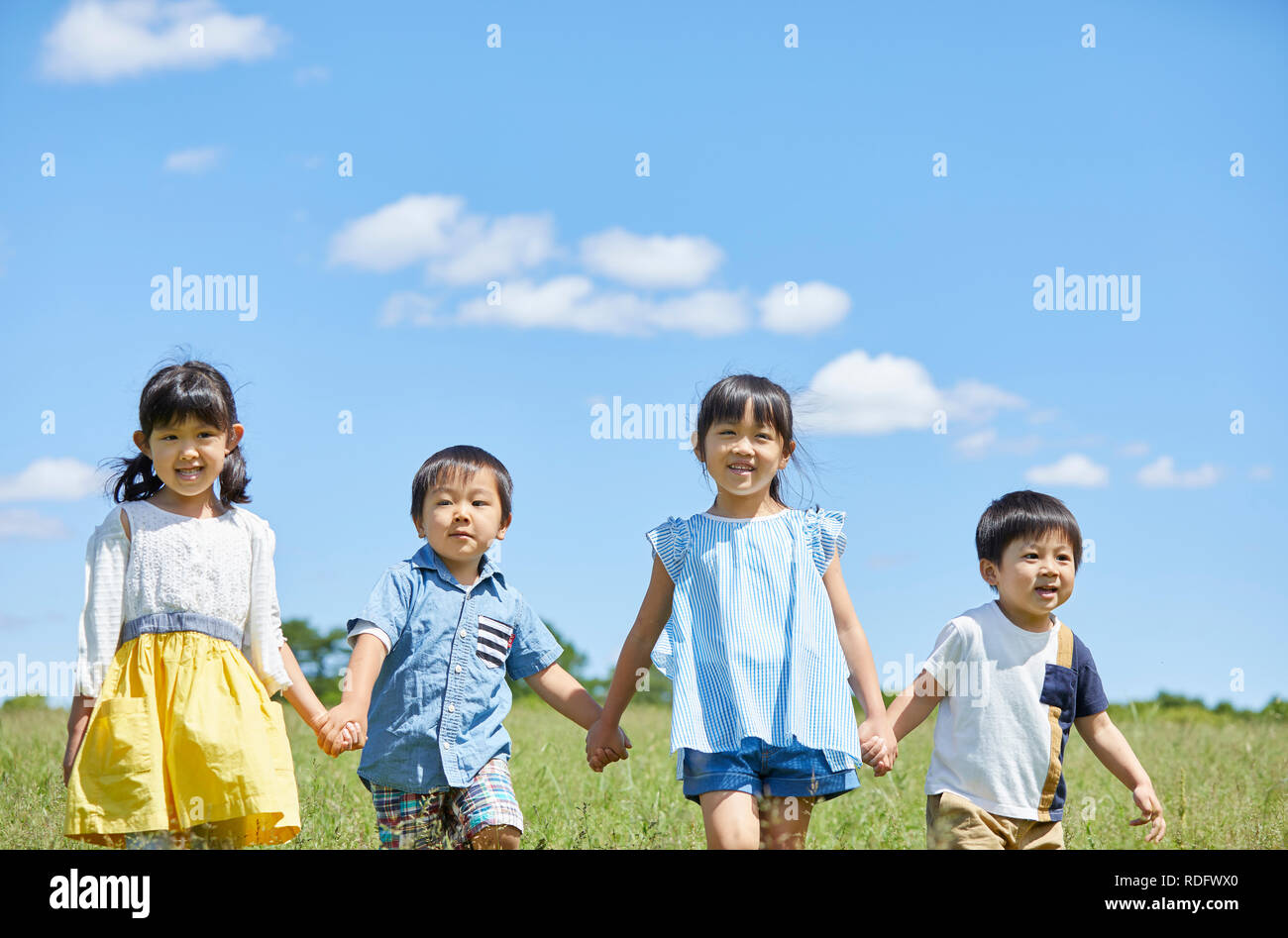 Japanese kids in a city park Stock Photo - Alamy