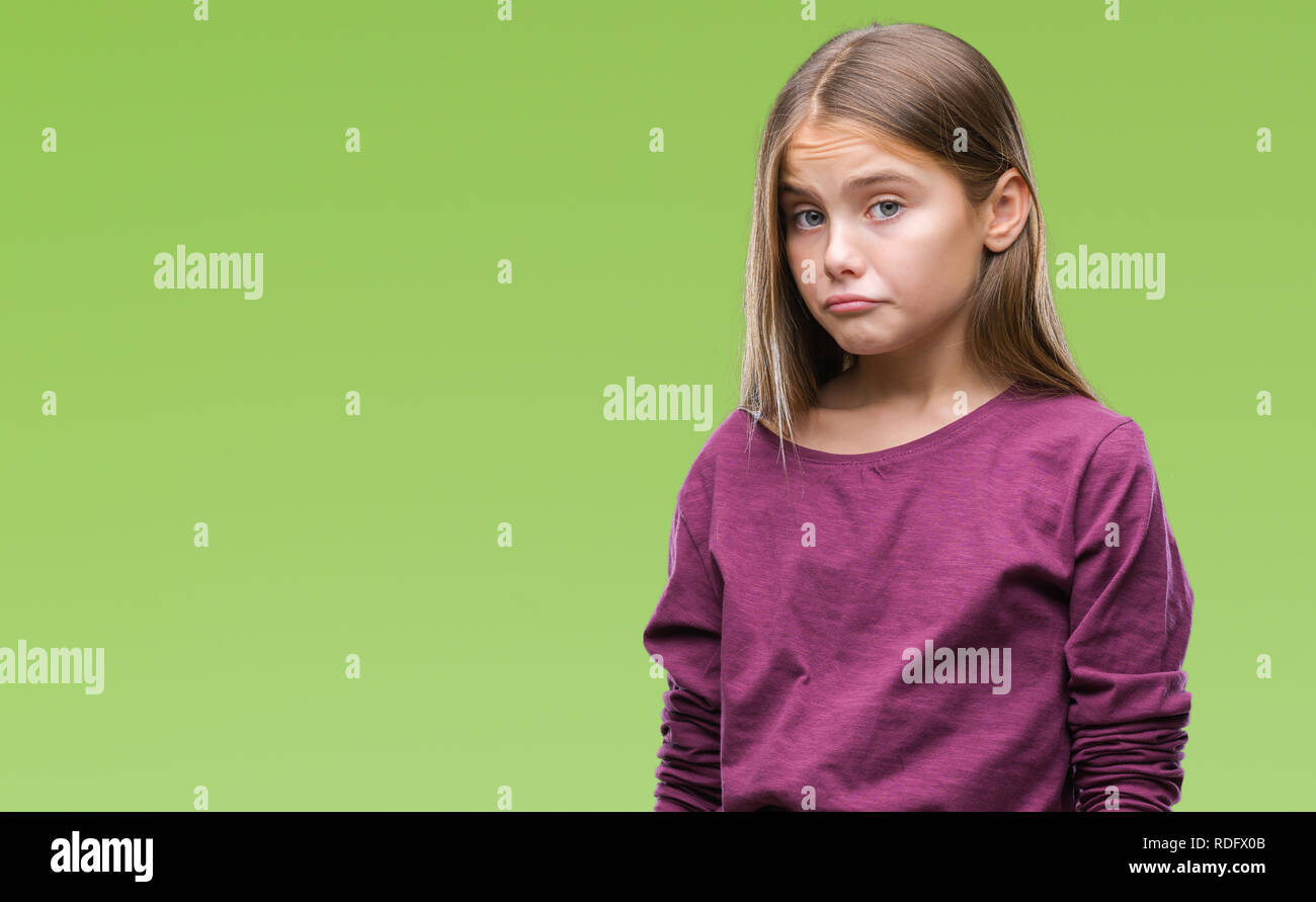 Young beautiful girl over isolated background depressed and worry for ...