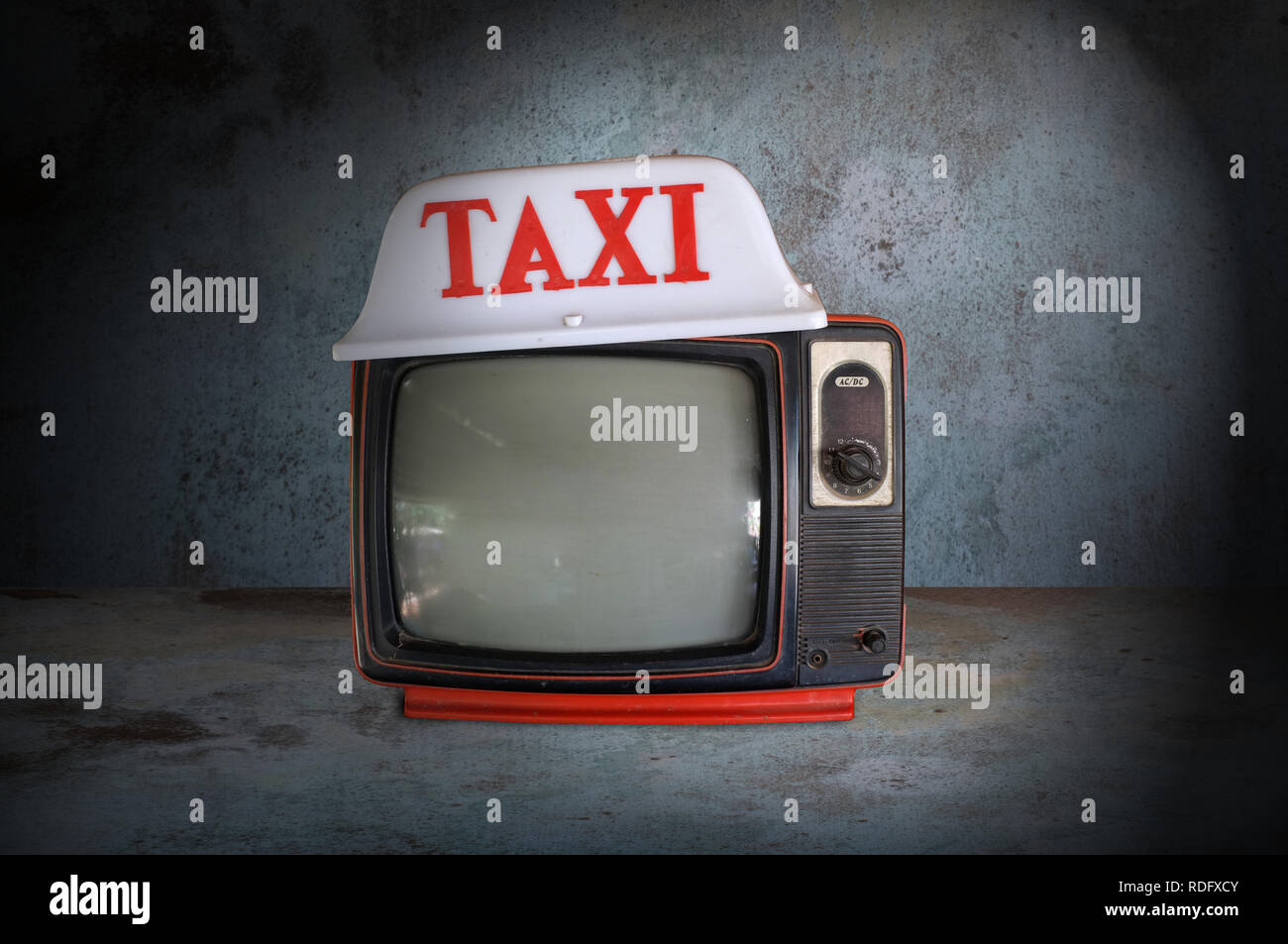 Retro old red TV on concrete room background Stock Photo - Alamy