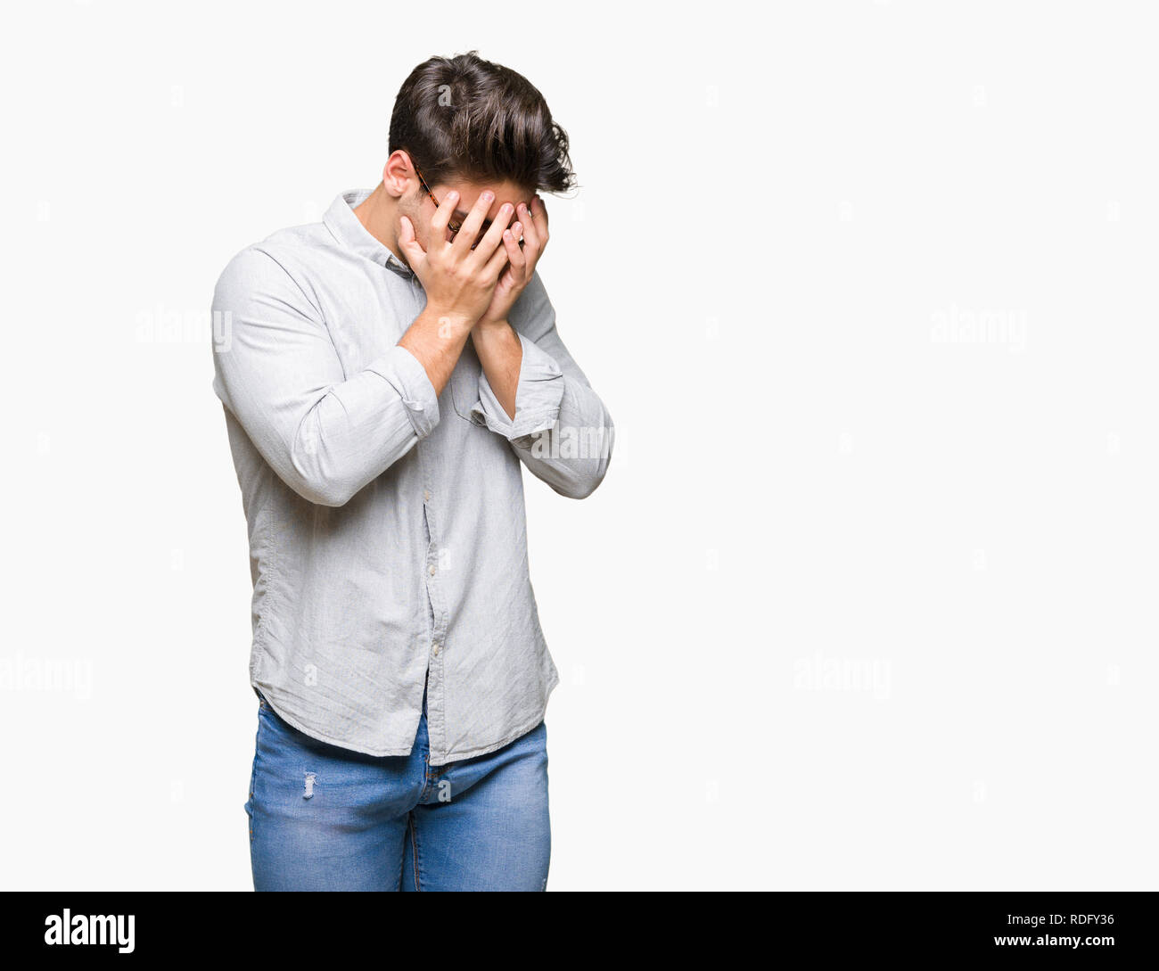Young handsome man wearing glasses over isolated background with sad ...