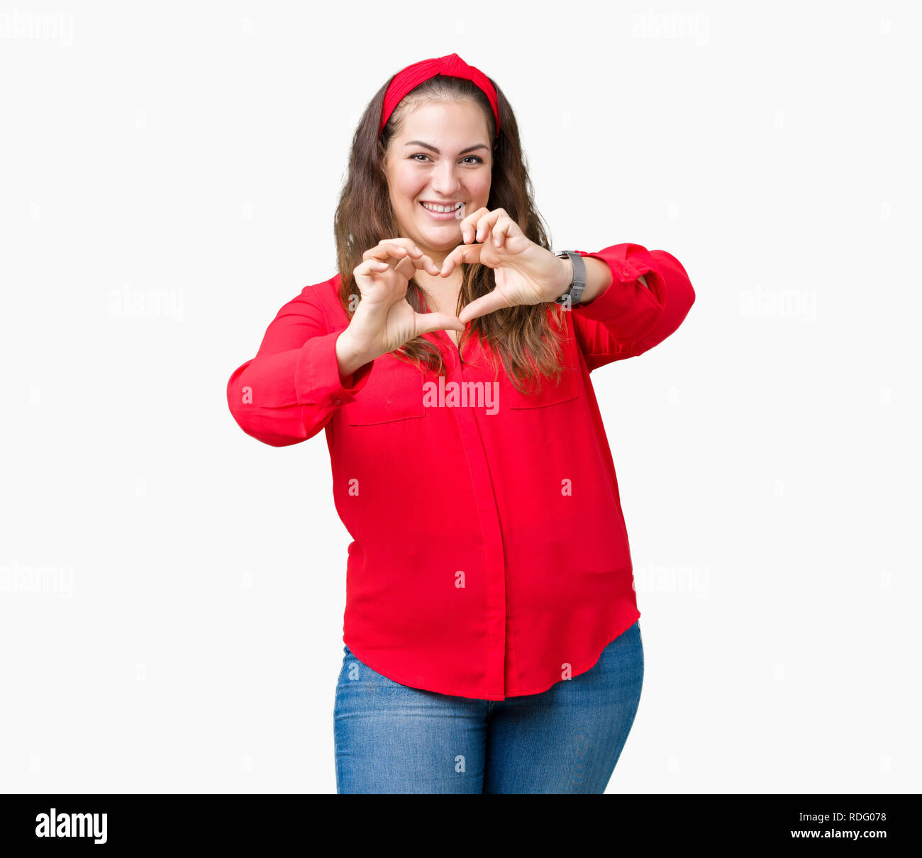 Beautiful plus size young woman over isolated background smiling in ...