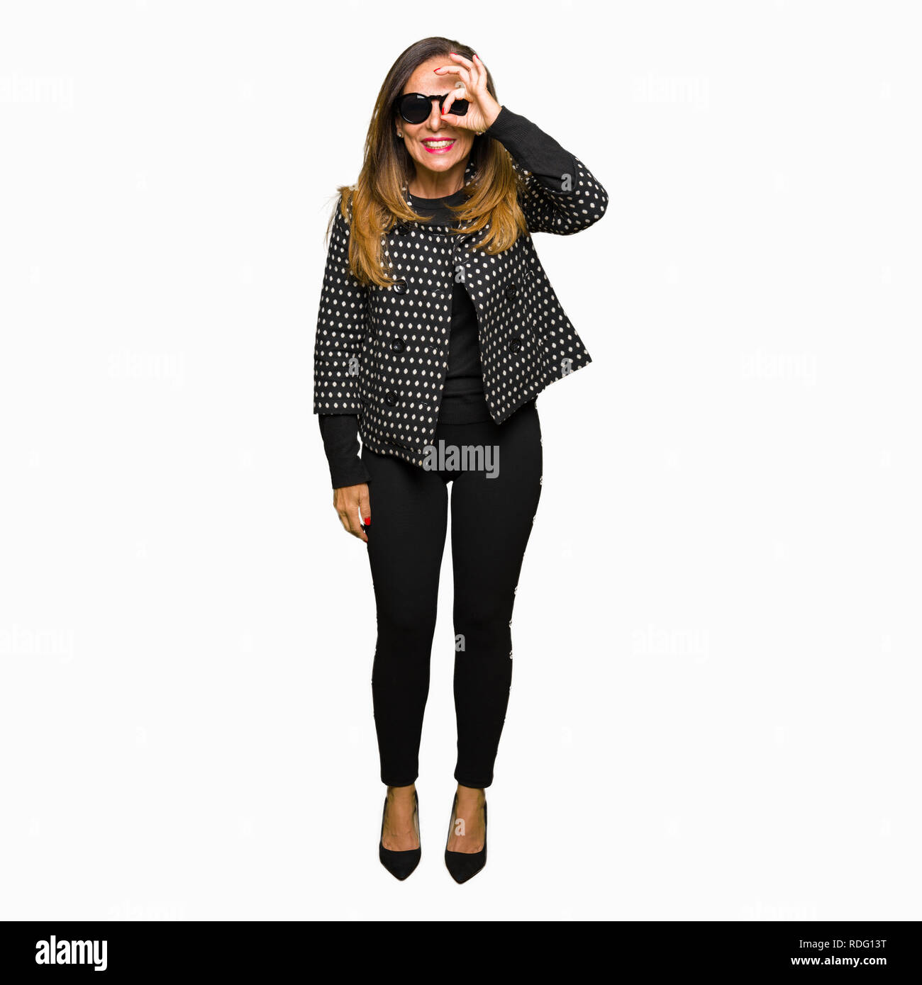 Hispanic woman hand ok sign Cut Out Stock Images & Pictures - Alamy