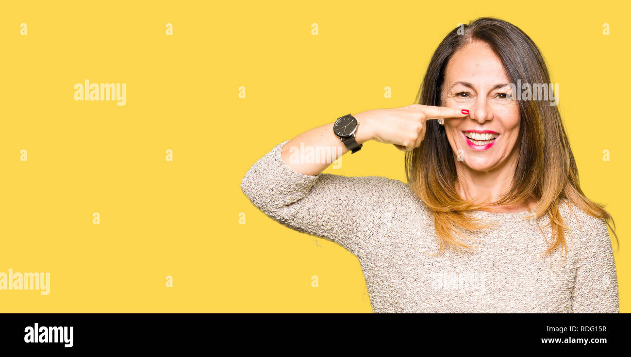 Woman finger pointing nose hi-res stock photography and images - Alamy
