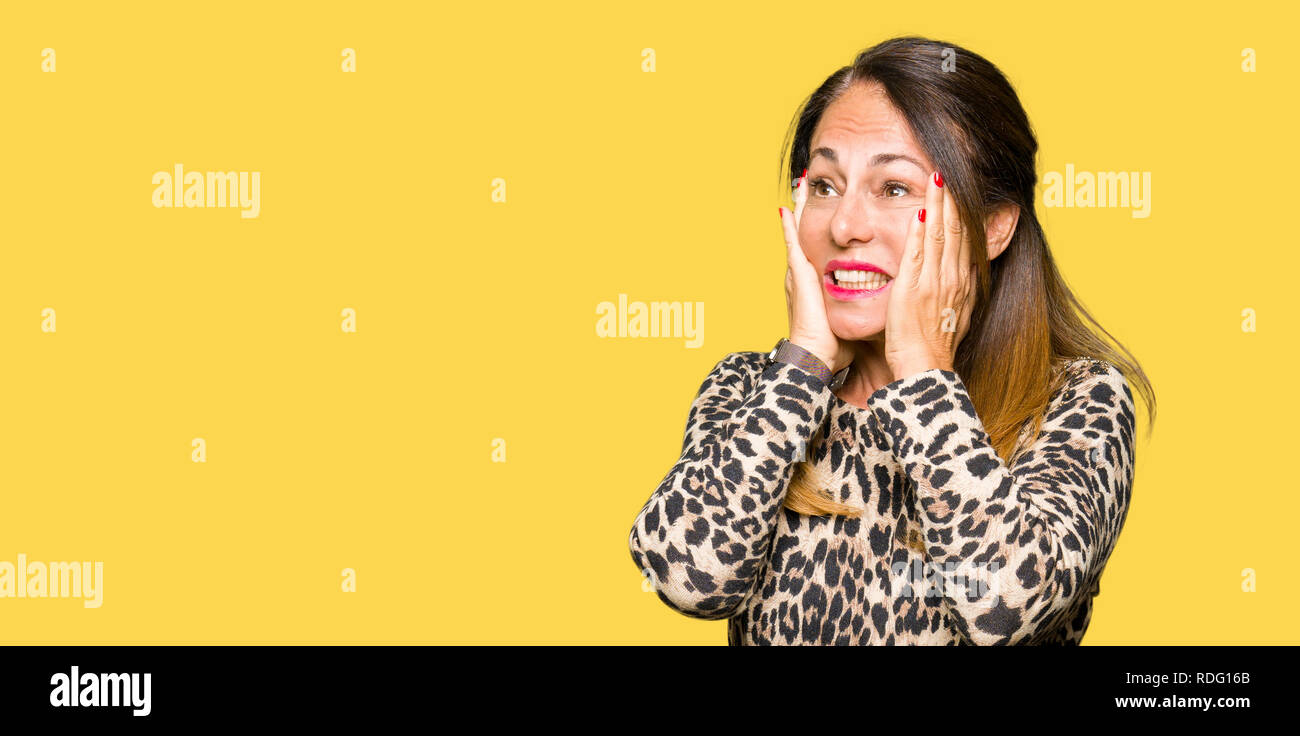 Beautiful middle age woman wearing leopard animal print dress Tired ...
