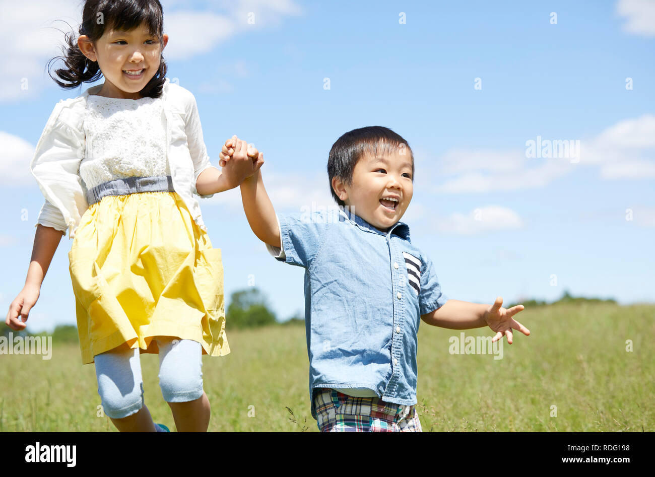 Japanese kids in a city park Stock Photo - Alamy