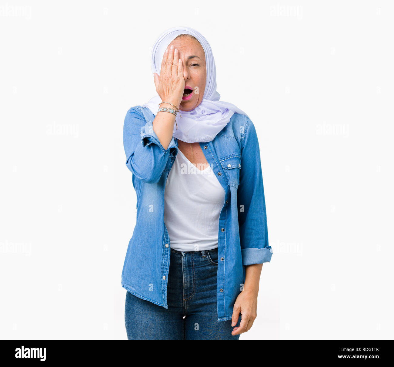 Middle age eastern arab woman wearing arabian hijab over isolated ...