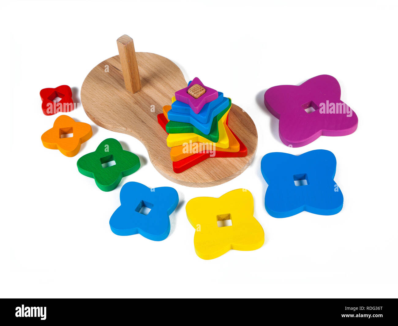 Photo of a wooden toys children's sorter pyramid of colorful parts in ...