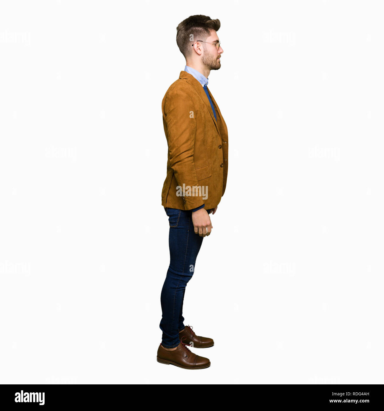 Young handsome elegant man wearing sunglasses looking to side, relax ...