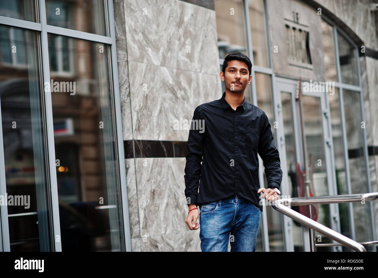 Stylish indian model man in casual clothes, black shirt posed outdoor ... Stylish indian model man in casual clothes, black shirt posed outdoor ...