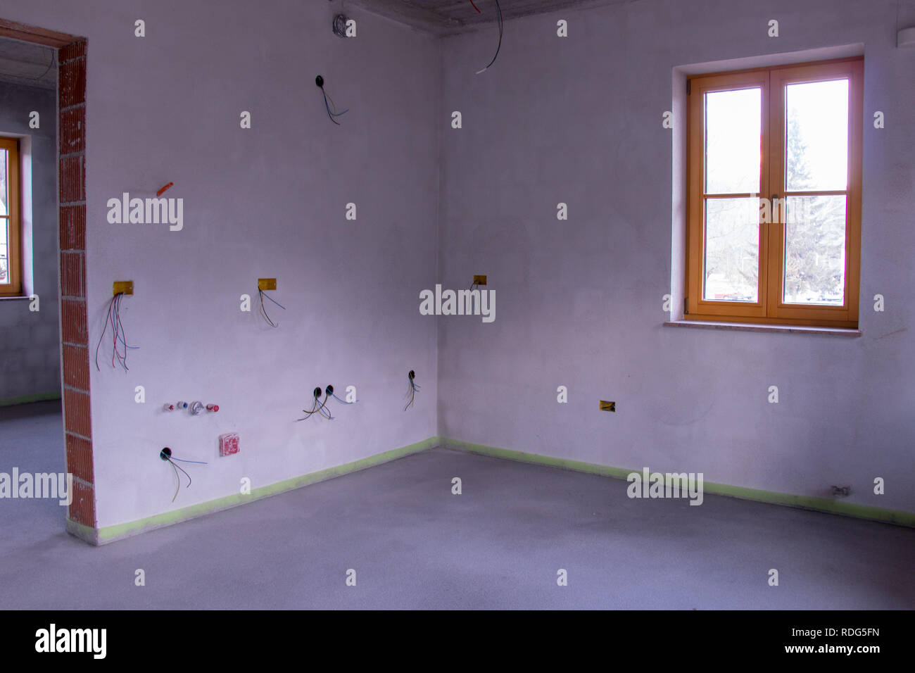 render wall with electric cables and window Stock Photo - Alamy