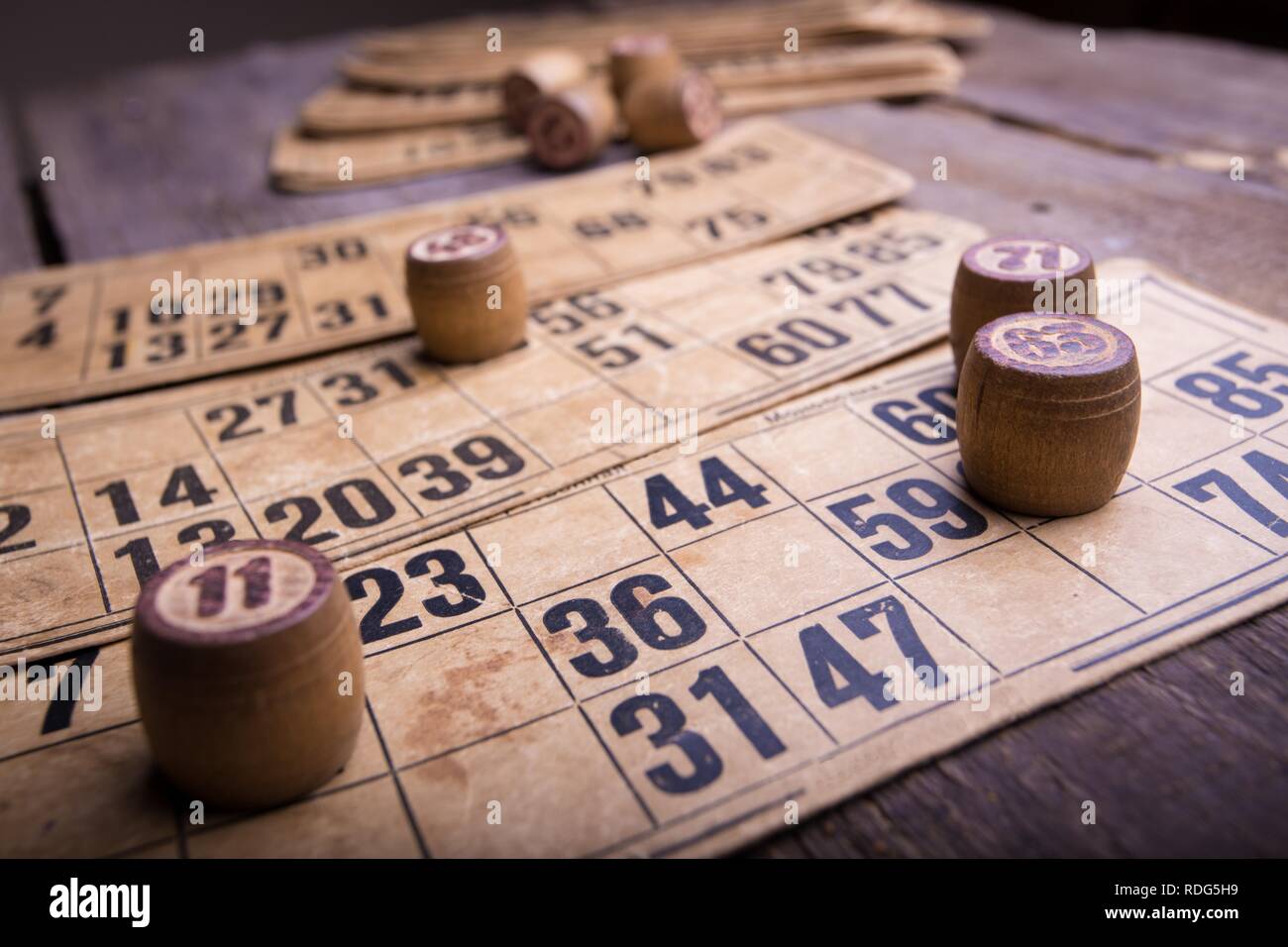 old wooden lotto barrels and game cards Stock Photo - Alamy