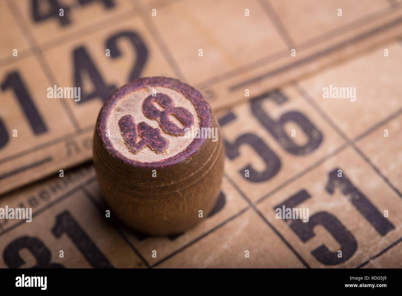 old wooden lotto barrels and game cards Stock Photo - Alamy