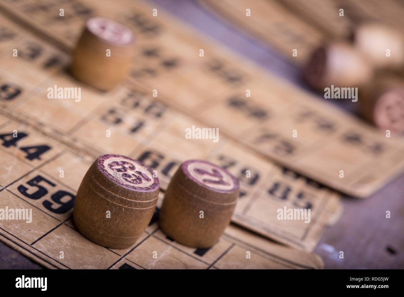 old wooden lotto barrels and game cards Stock Photo - Alamy
