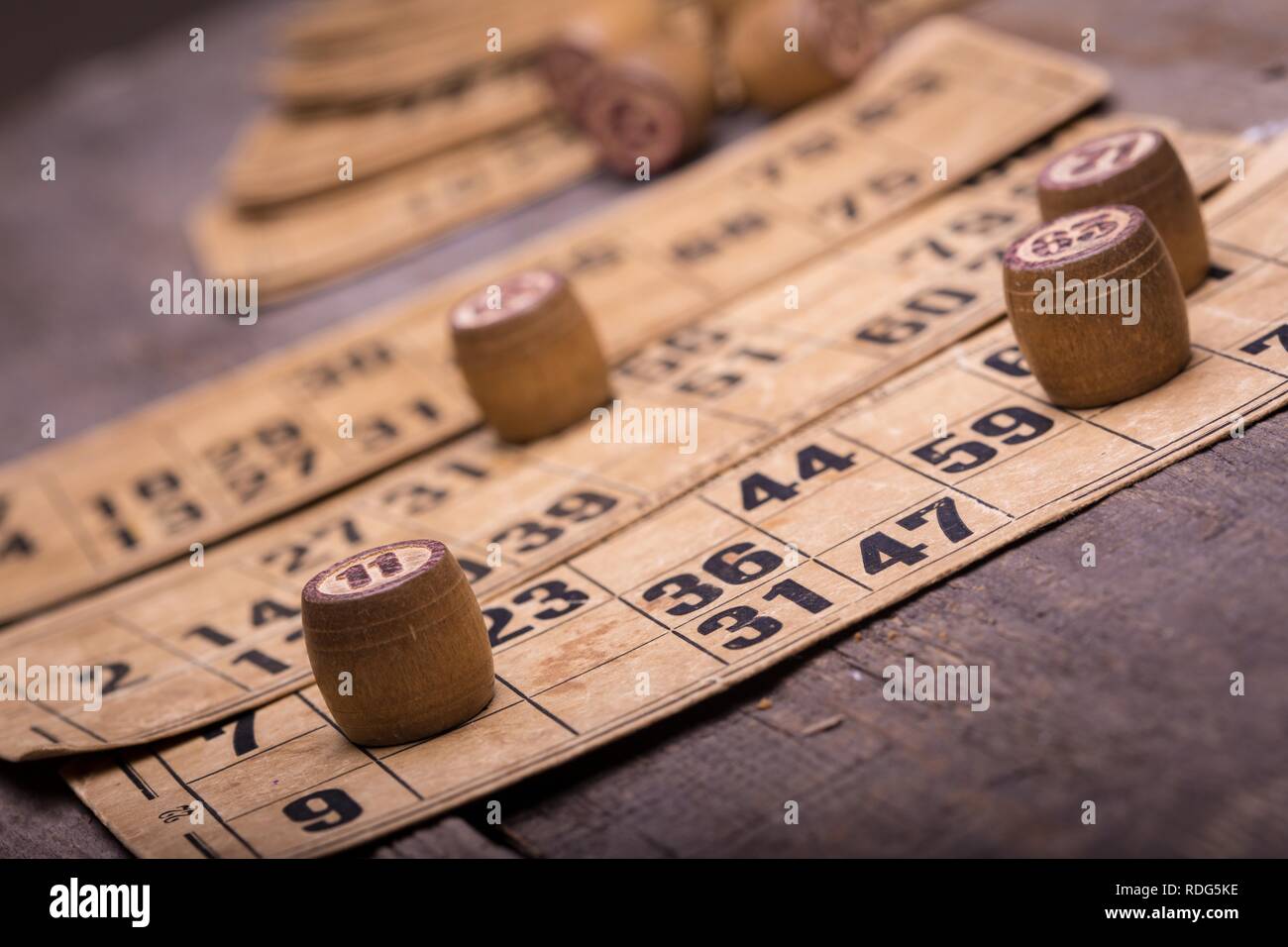 old wooden lotto barrels and game cards Stock Photo - Alamy