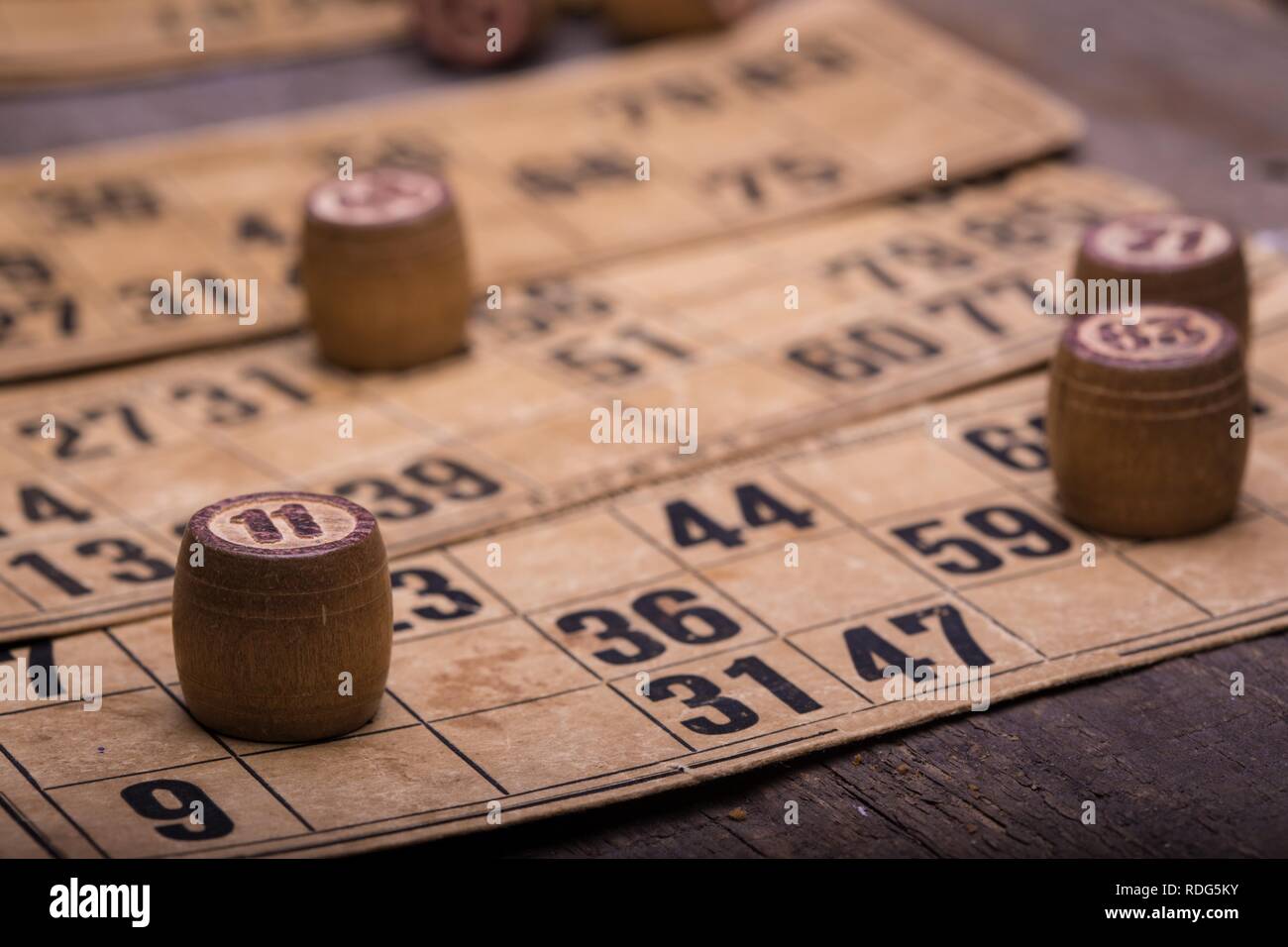 old wooden lotto barrels and game cards Stock Photo - Alamy