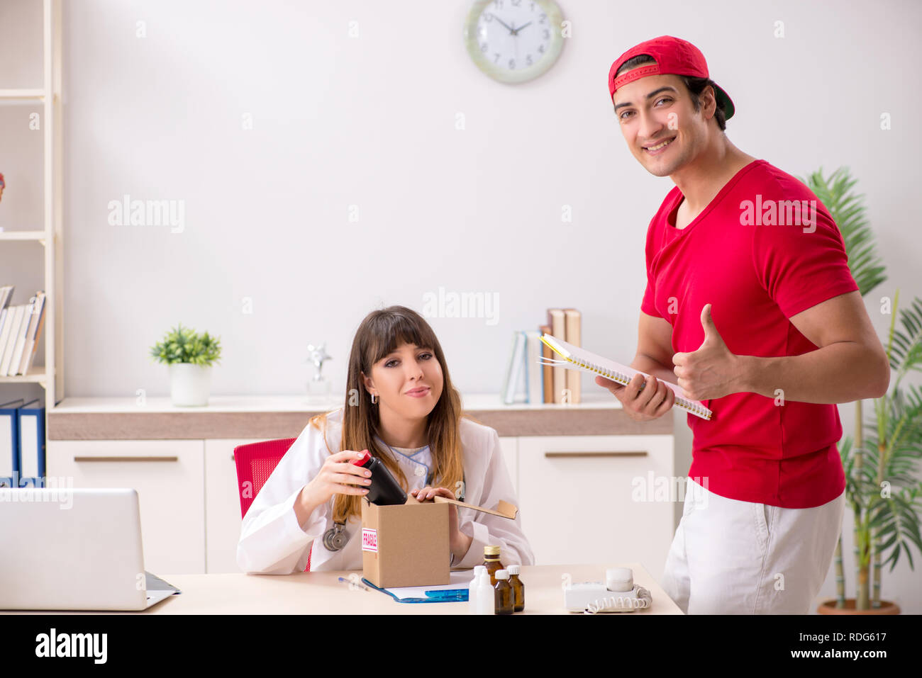 Courier delivering urgent parcel hi-res stock photography and images ...