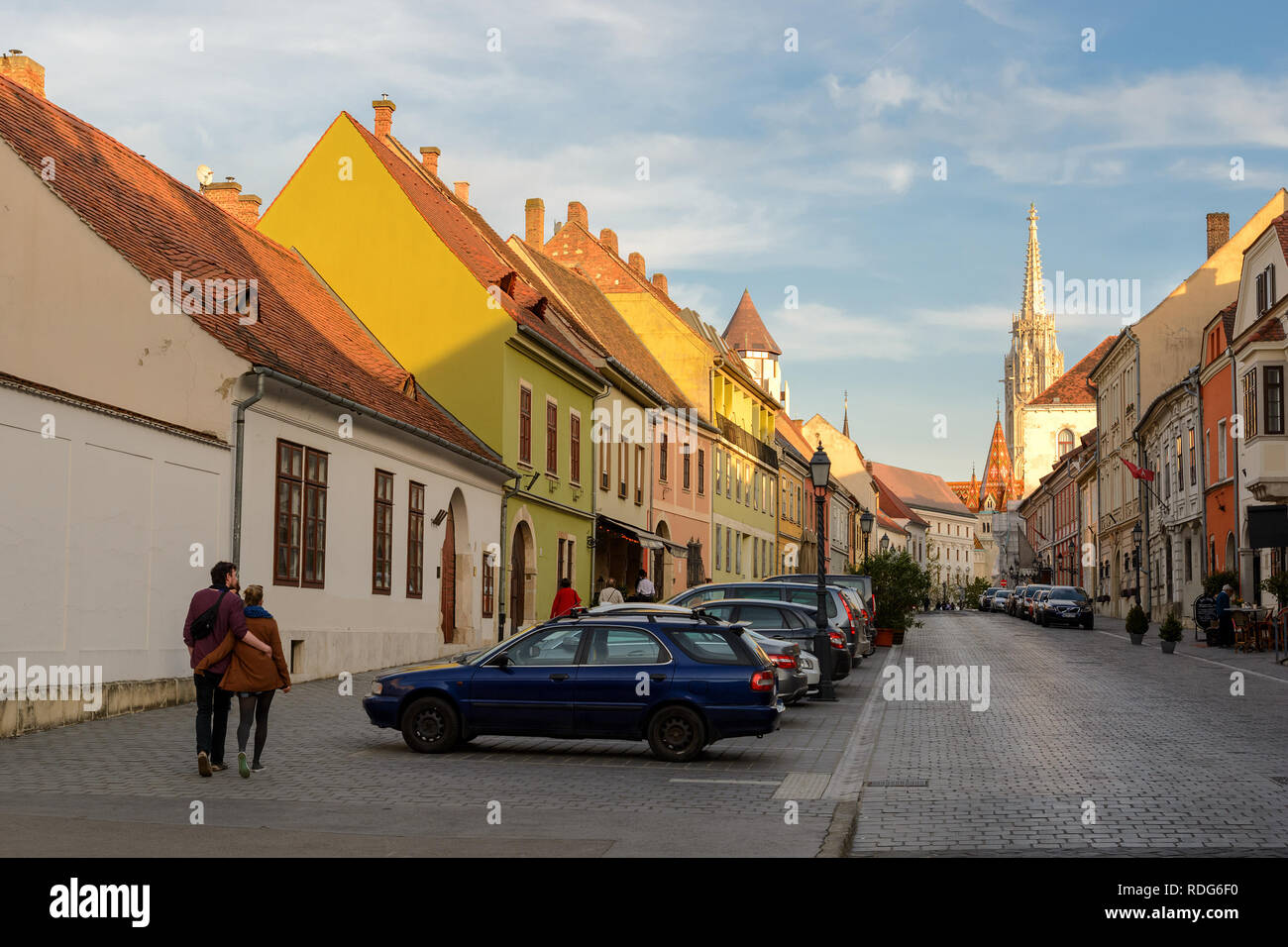 Fortuna street in Budapest old city, hugging couple walking Stock Photo ...