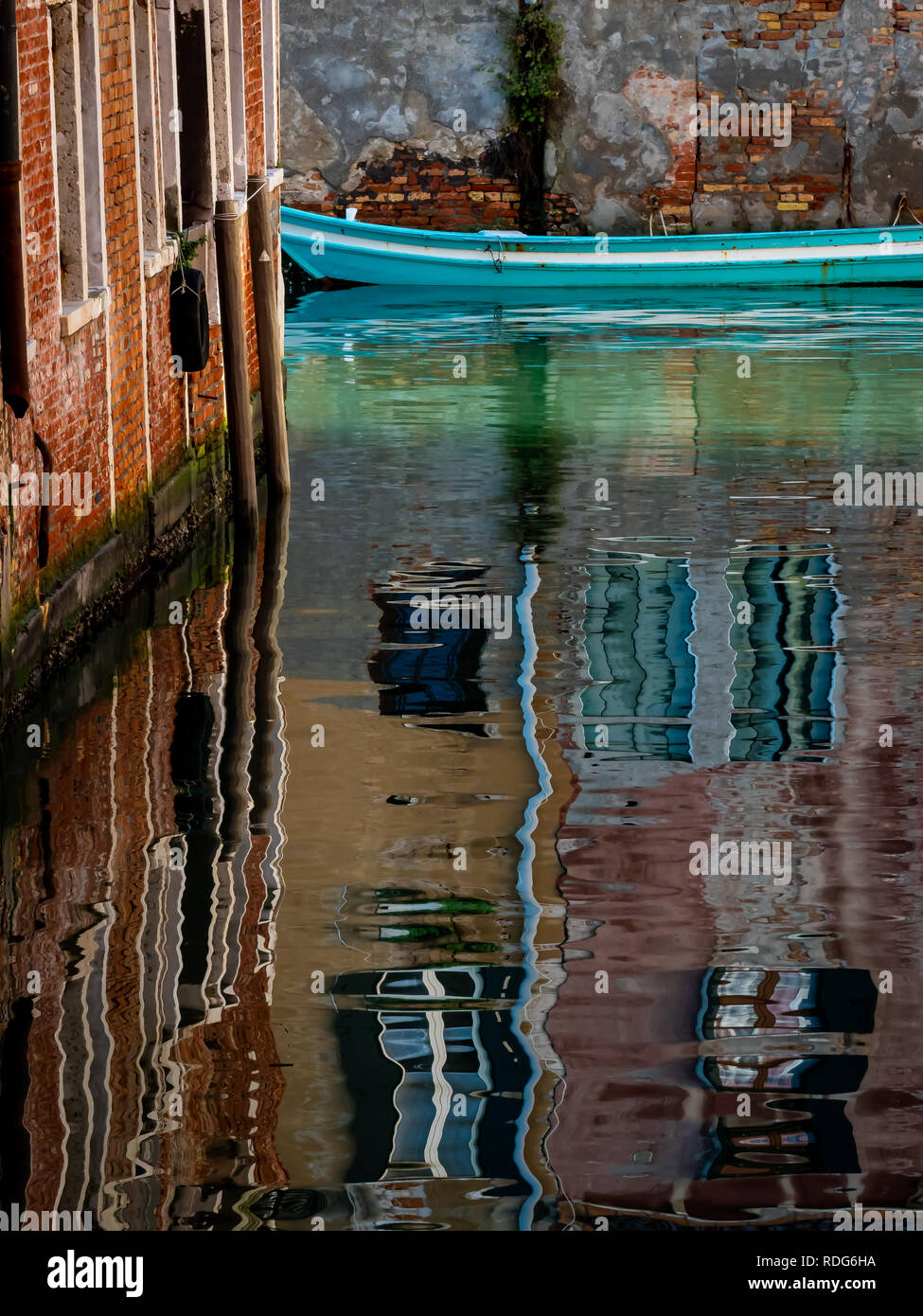 Boat reflections in water Stock Photo - Alamy