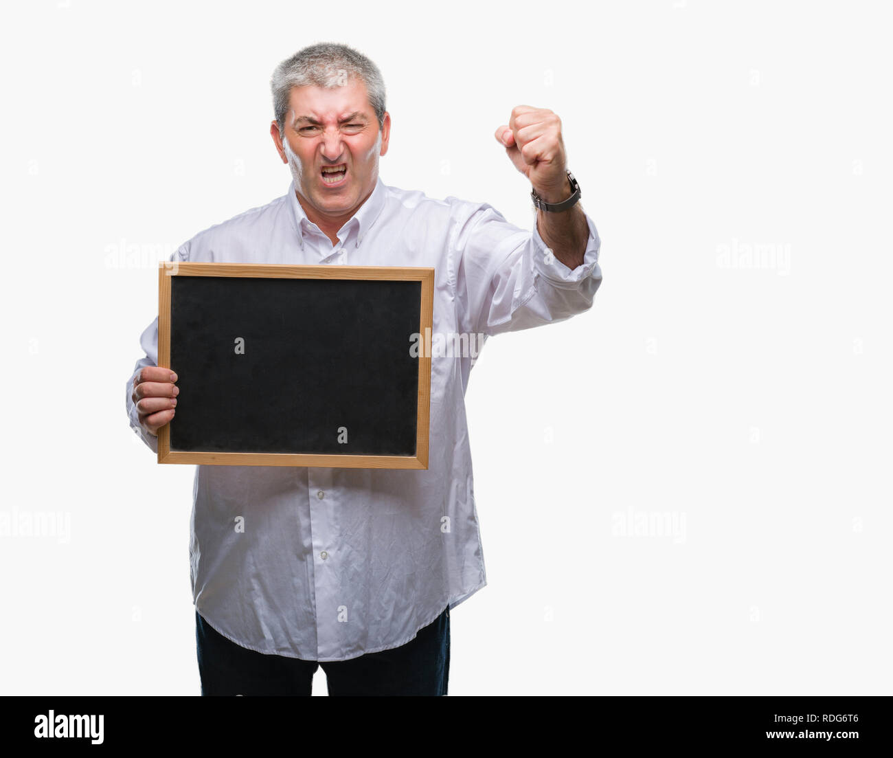 Handsome senior teacher man holding blackboard over isolated background ...