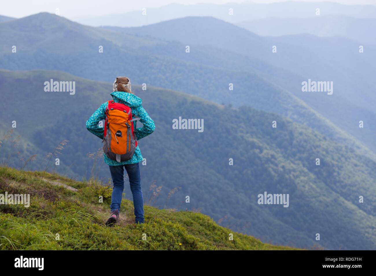 tourist girl and mountain views Stock Photo - Alamy
