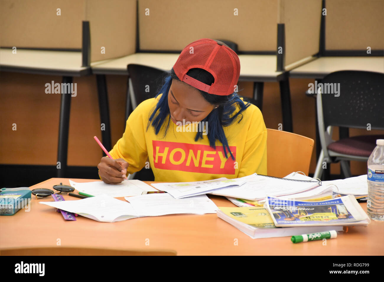 young black woman studying in real collage library Real, realistic ...