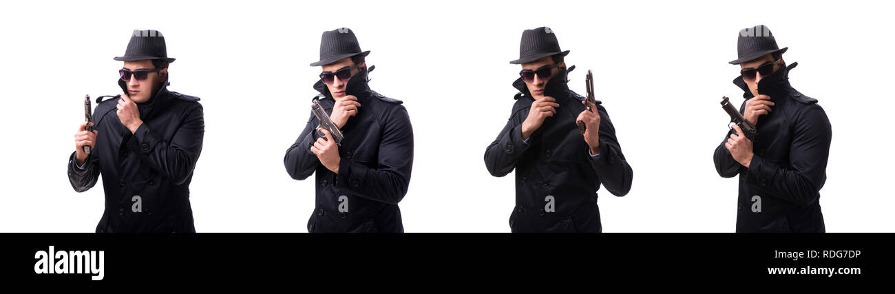 Man spy with handgun isolated on white background Stock Photo - Alamy
