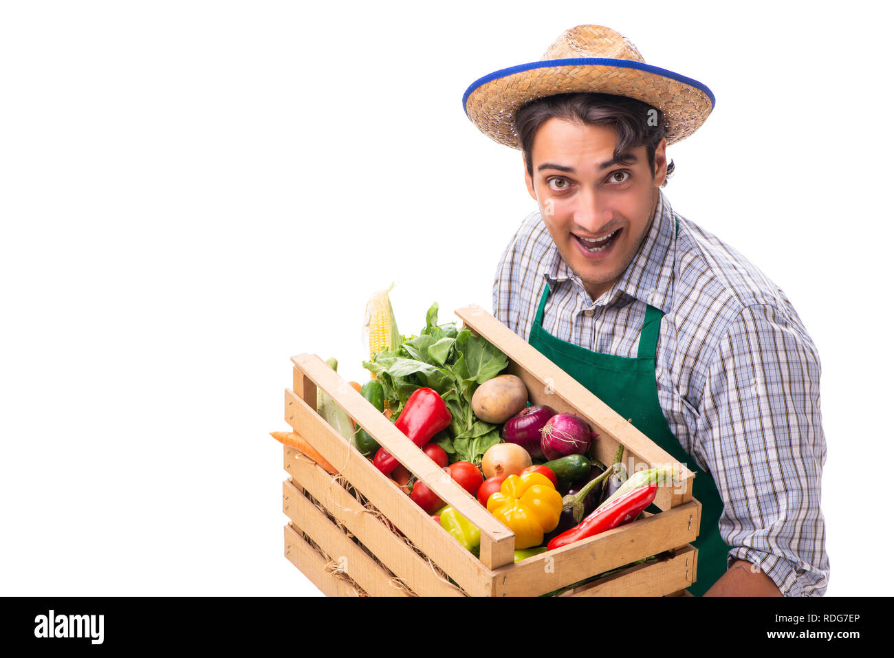 Young farmer with fresh produce isolated on white background Stock ...