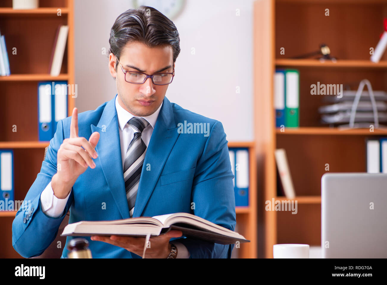 Lawyer working in the office Stock Photo - Alamy