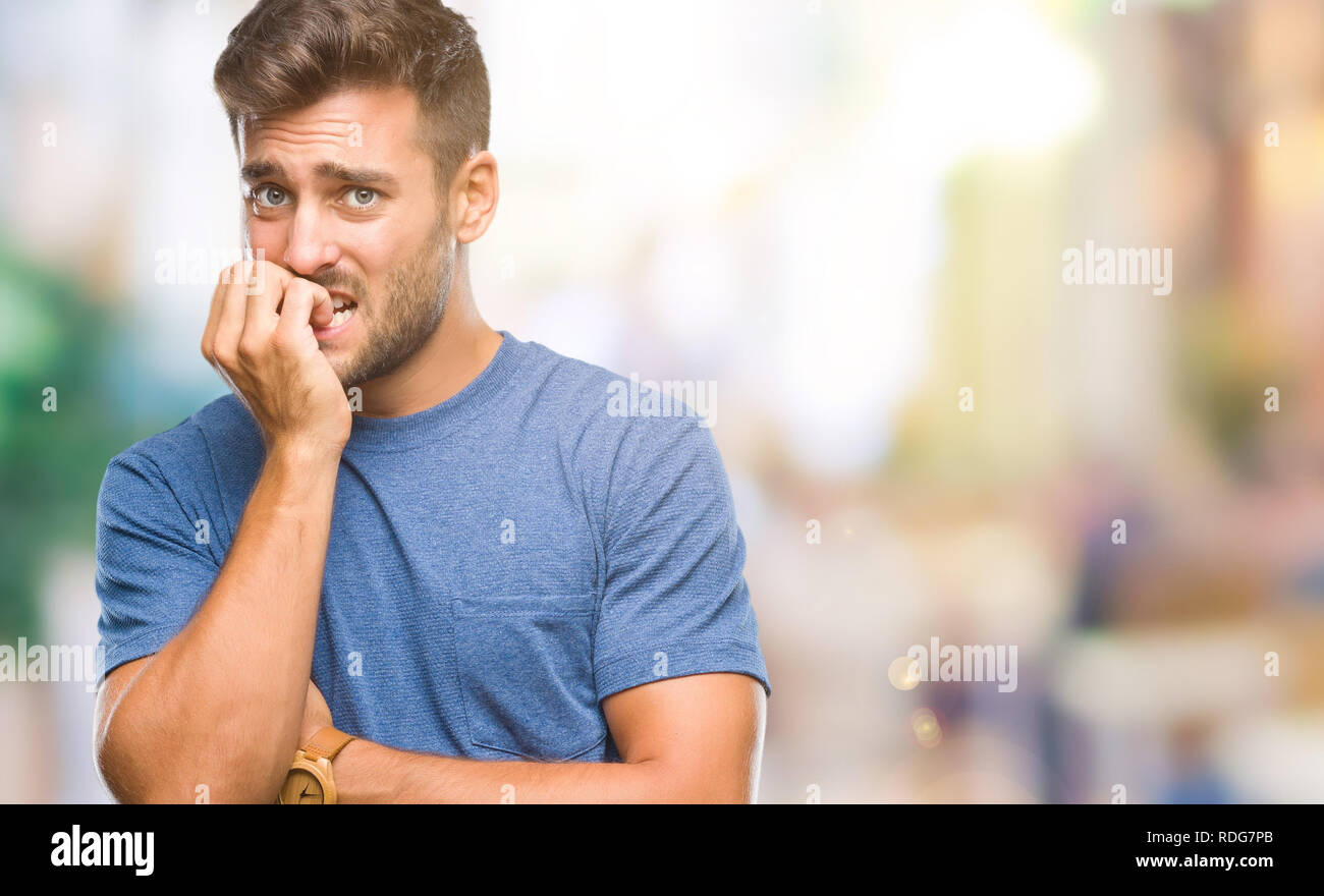 Young handsome man over isolated background looking stressed and ...