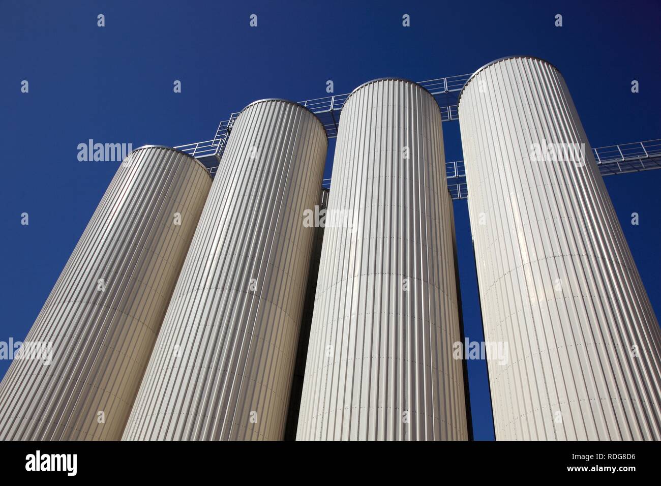 Beer storage tanks of a brewery Stock Photo - Alamy