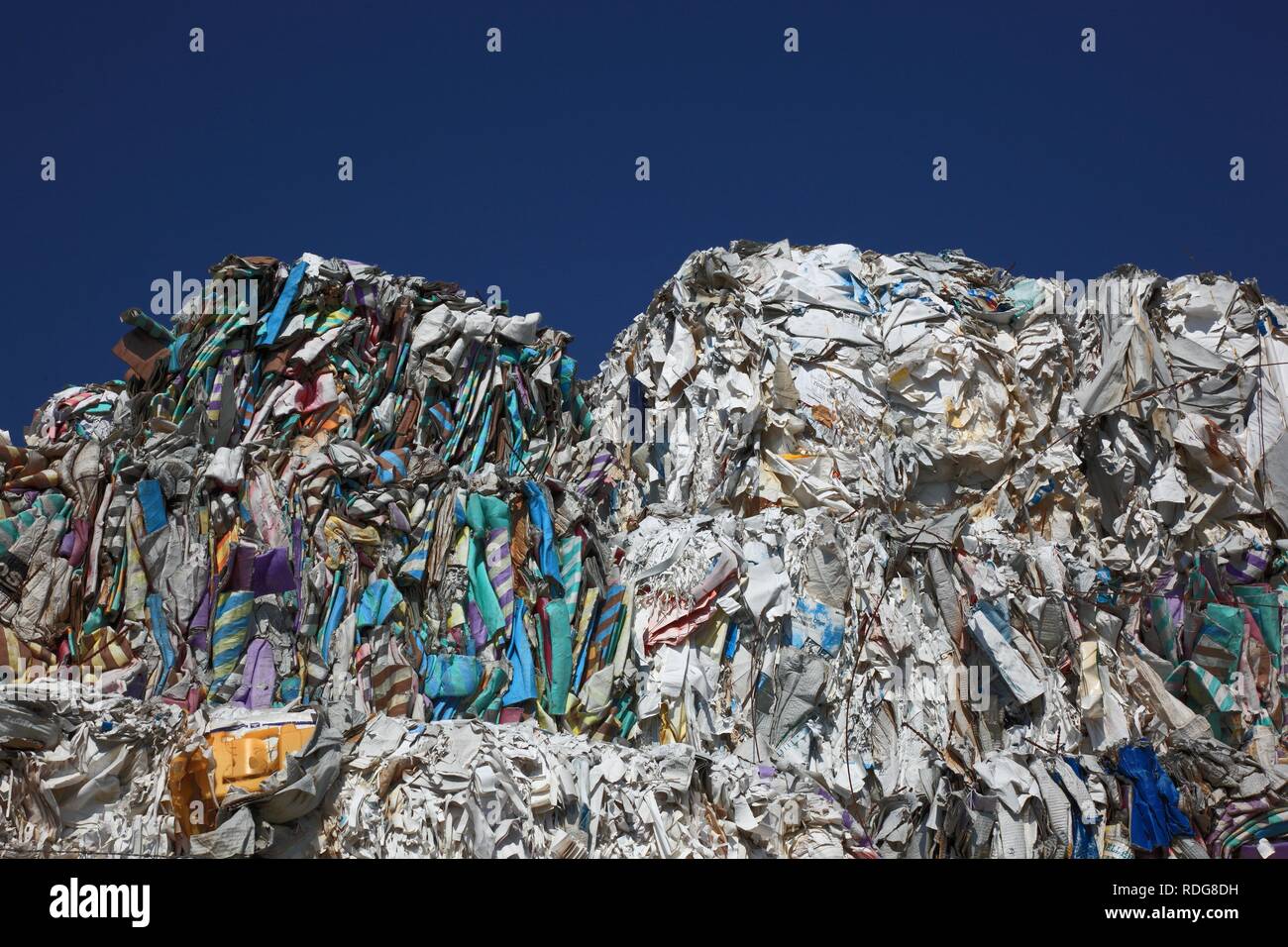 Used paper, stacks of used paper at a recycling yard, paper recycling ...