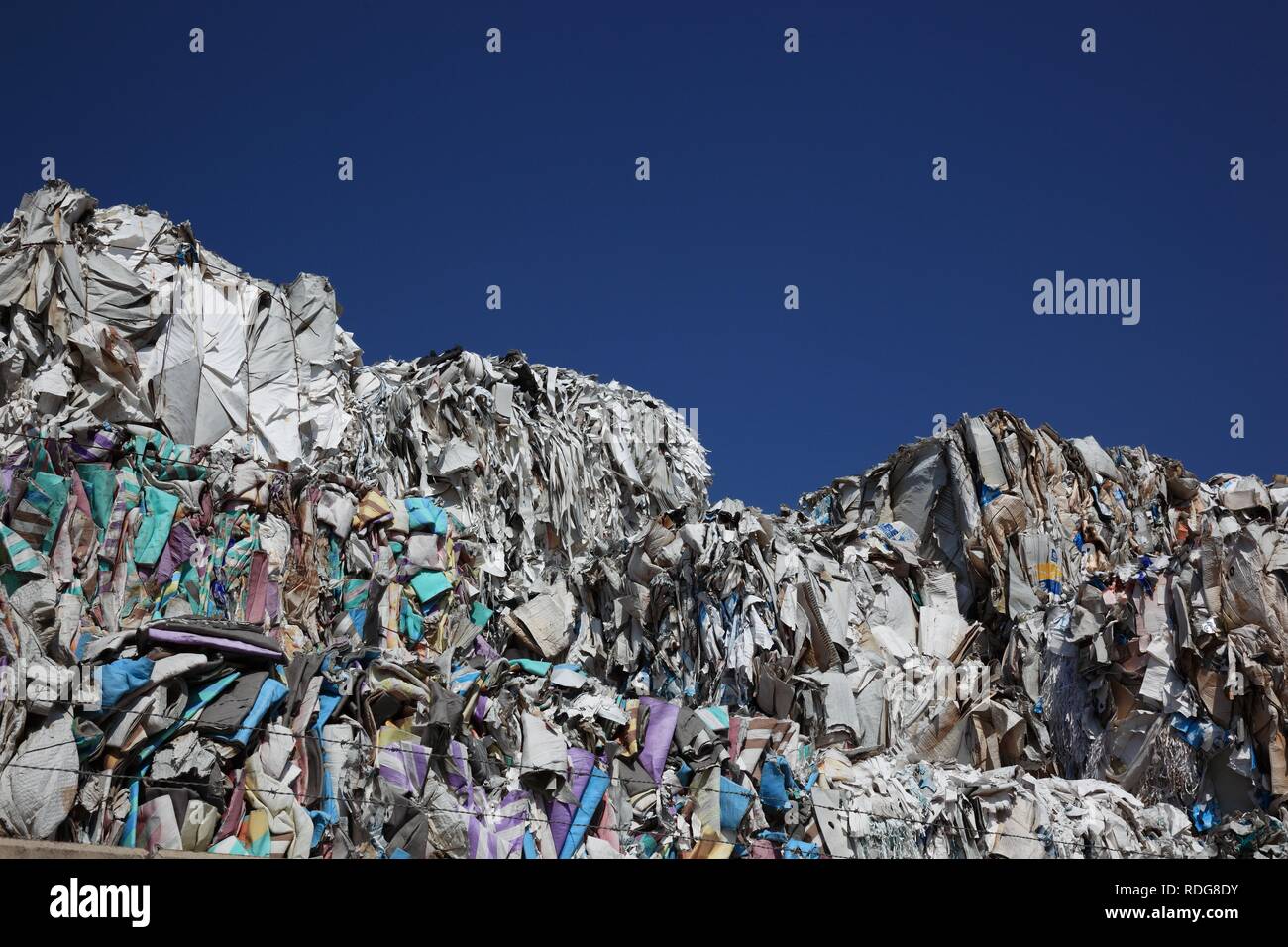 Used paper, stacks of used paper at a recycling yard, paper recycling ...